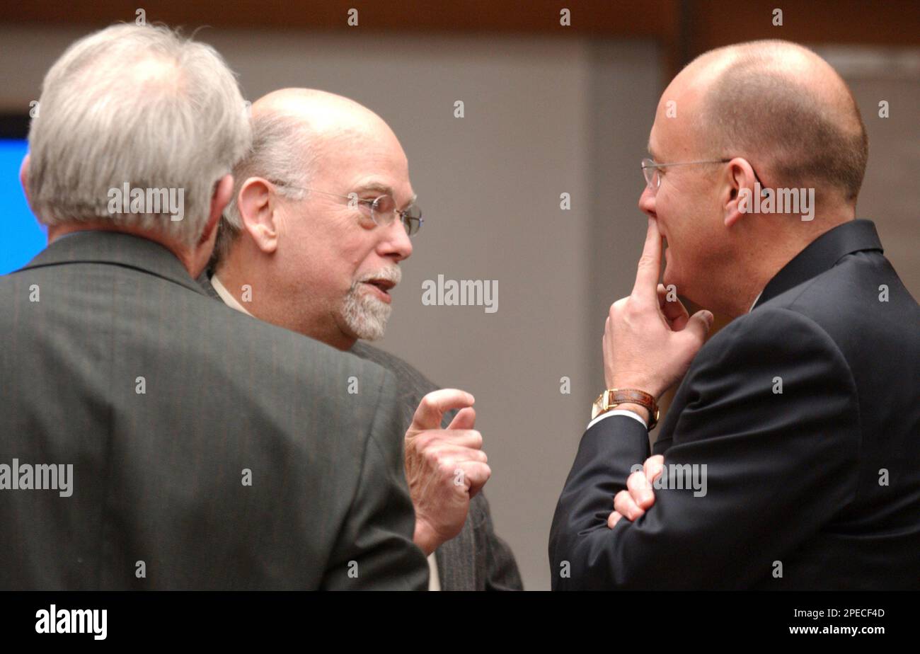 Defense Attorney Pedro Irigonegaray, left, talks with prosecutor Tom ...