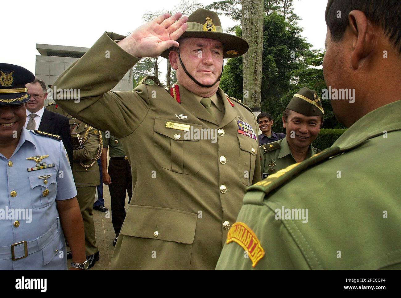 Australian Defense Force Chief Gen. Peter Cosgrove, center, returns a ...