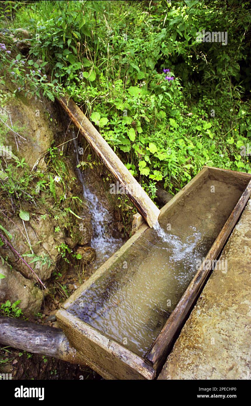Wooden trough spring water hi-res stock photography and images - Alamy