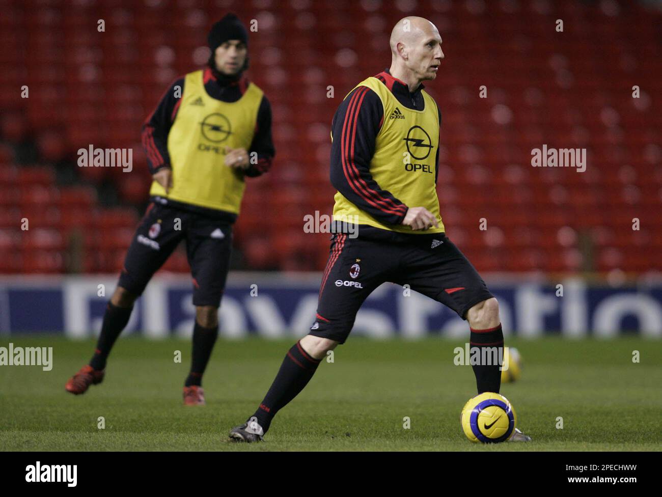 AC Milan's Jaap Stam, right, trains at Old Trafford Stadium the day ...