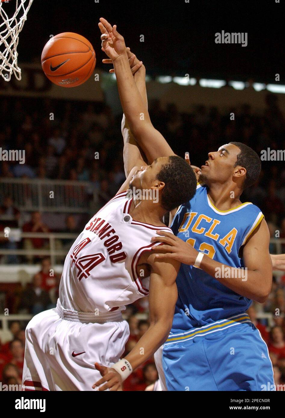 Stanford forward Fred Washington, left, and UCLA guard Josh Shipp vie ...