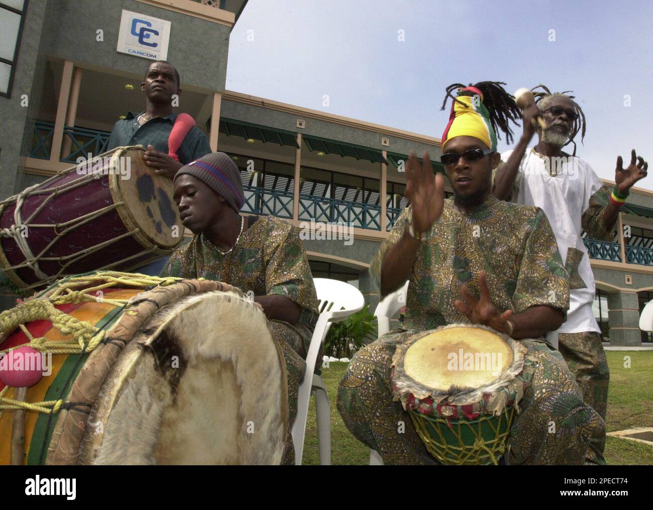A group of Rastafarians play their traditional drums during the ...