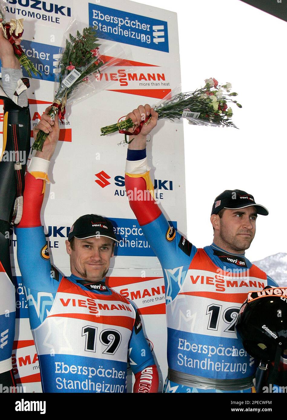 USA's Mark Grimmette, left, and Brian Martin celebrate their third ...