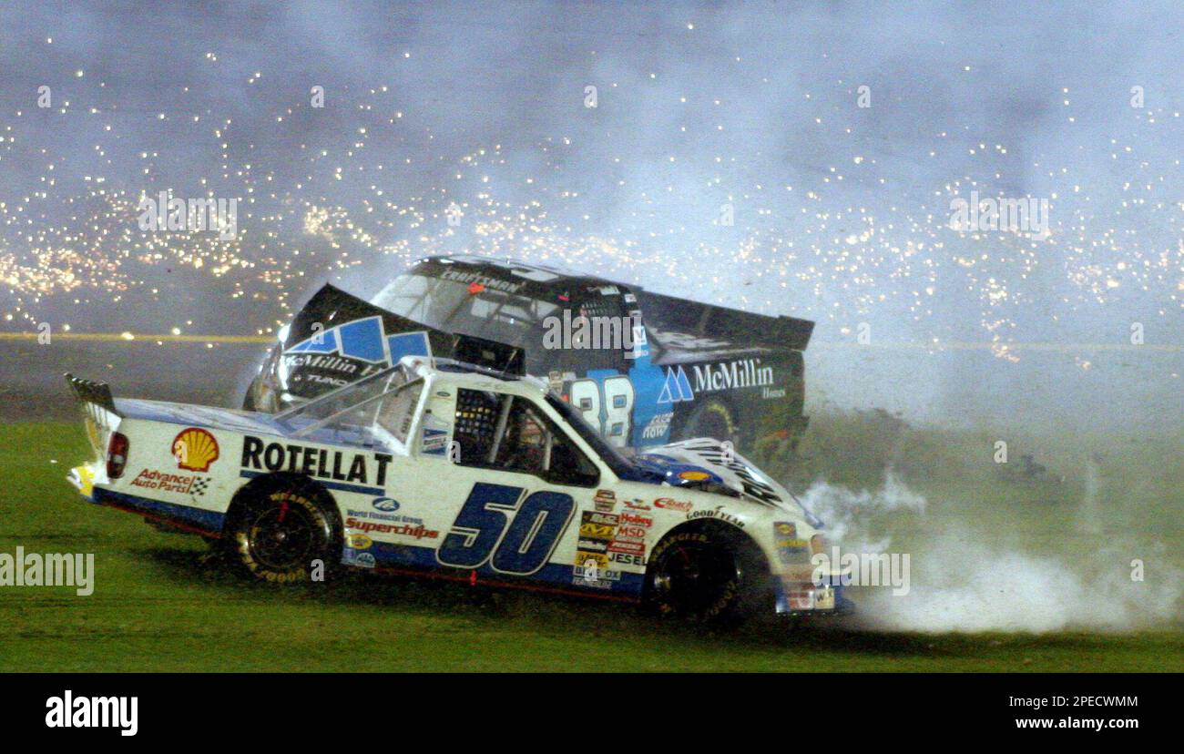 The trucks of NASCAR Truck Series drivers Todd Kluever (50) and Brandon ...