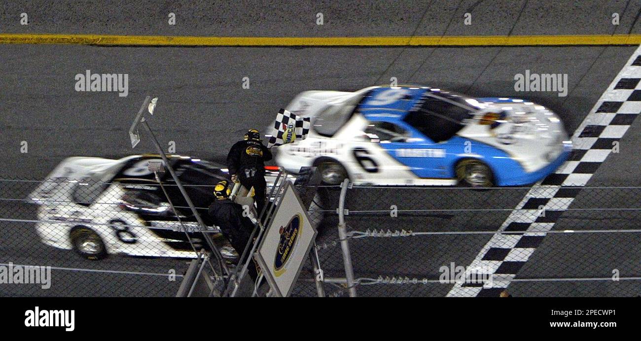 Mark Martin, (6), takes the checkered flag in front of Bobby Hamilton ...