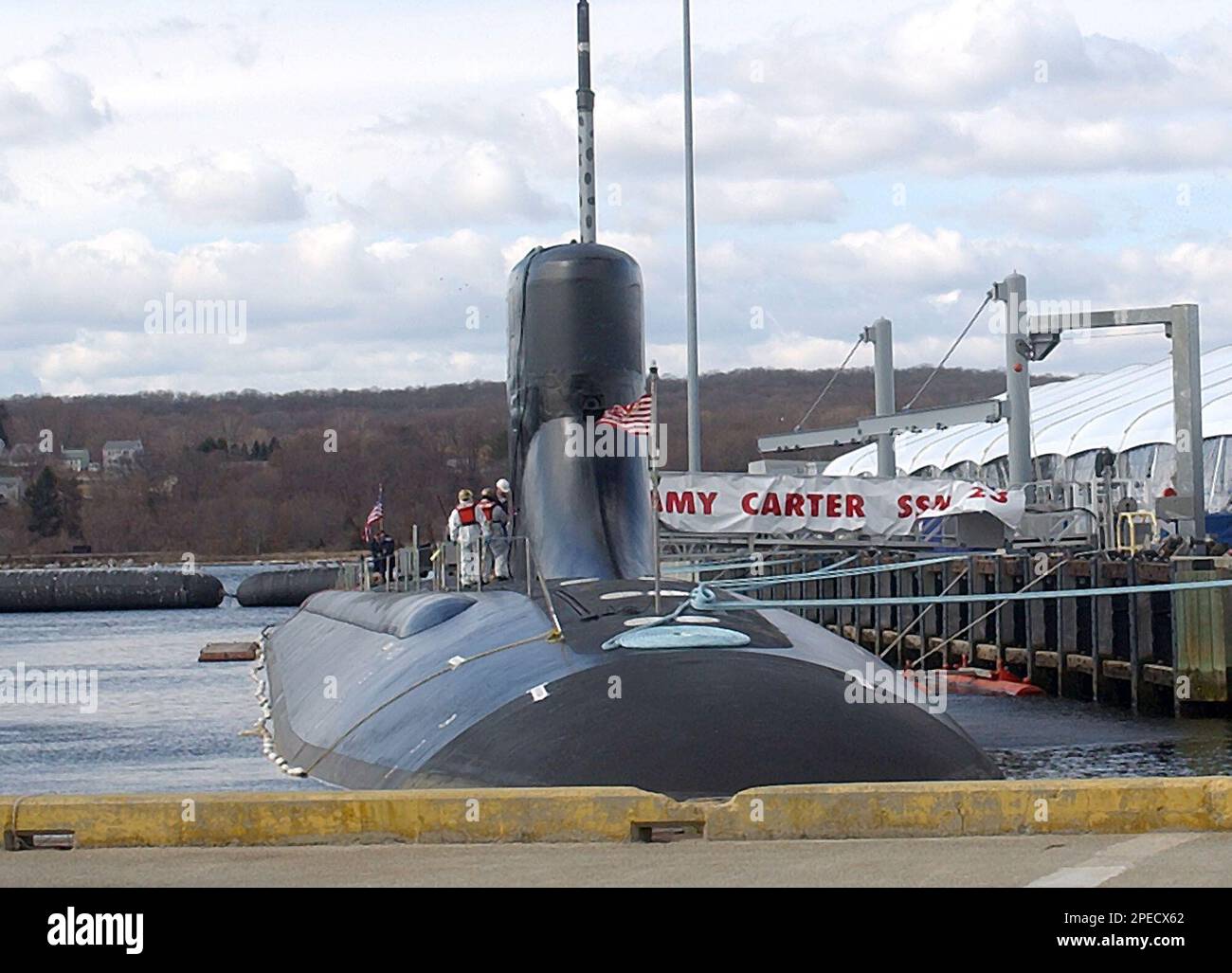The Sea Wolf Class fast attack submarine Jimmy Carter is seen tied to a ...