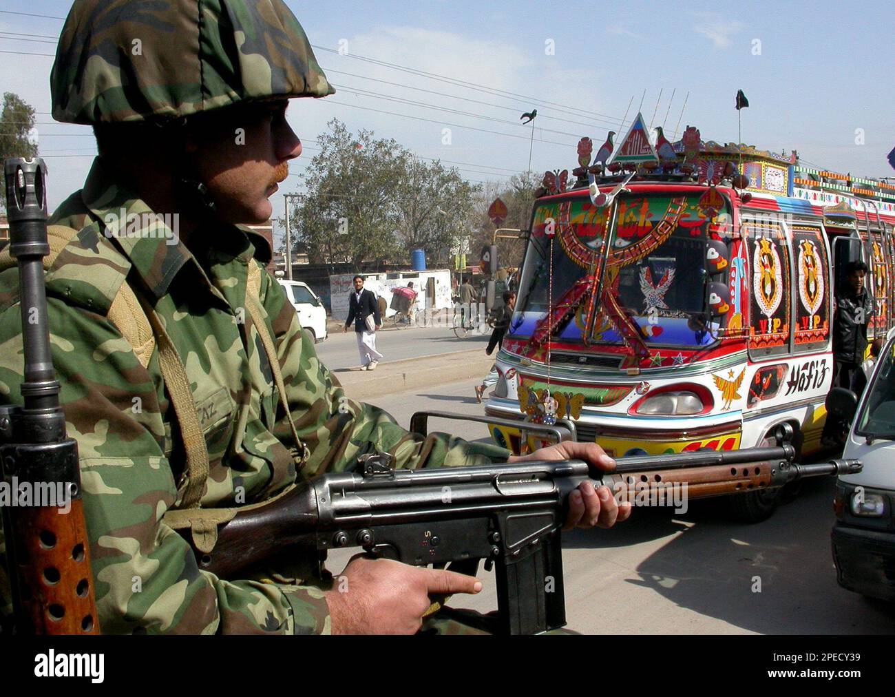 Soldier of Pakistan army patrols in downtown of Peshawar, Pakistan on ...