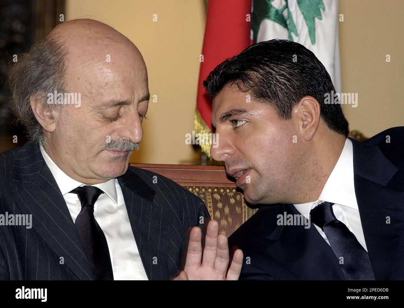 Bahaa Hariri, the eldest son of slain former premier Rafik Hariri, right, speaks to Walid ...