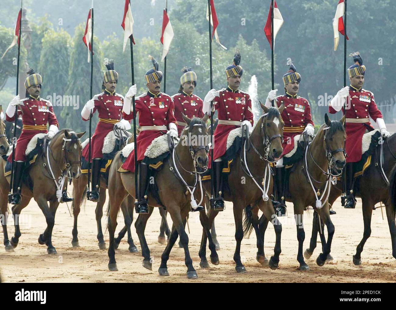 The Indian presidential guards ride their horses during a welcome ...