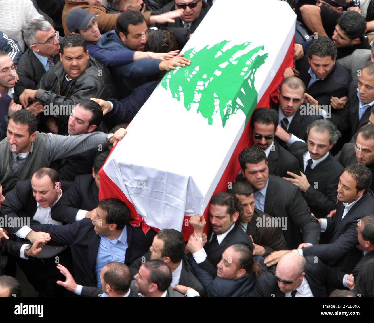 The coffin of former Lebanese Prime Minister Rafik Harari arrives for a ...