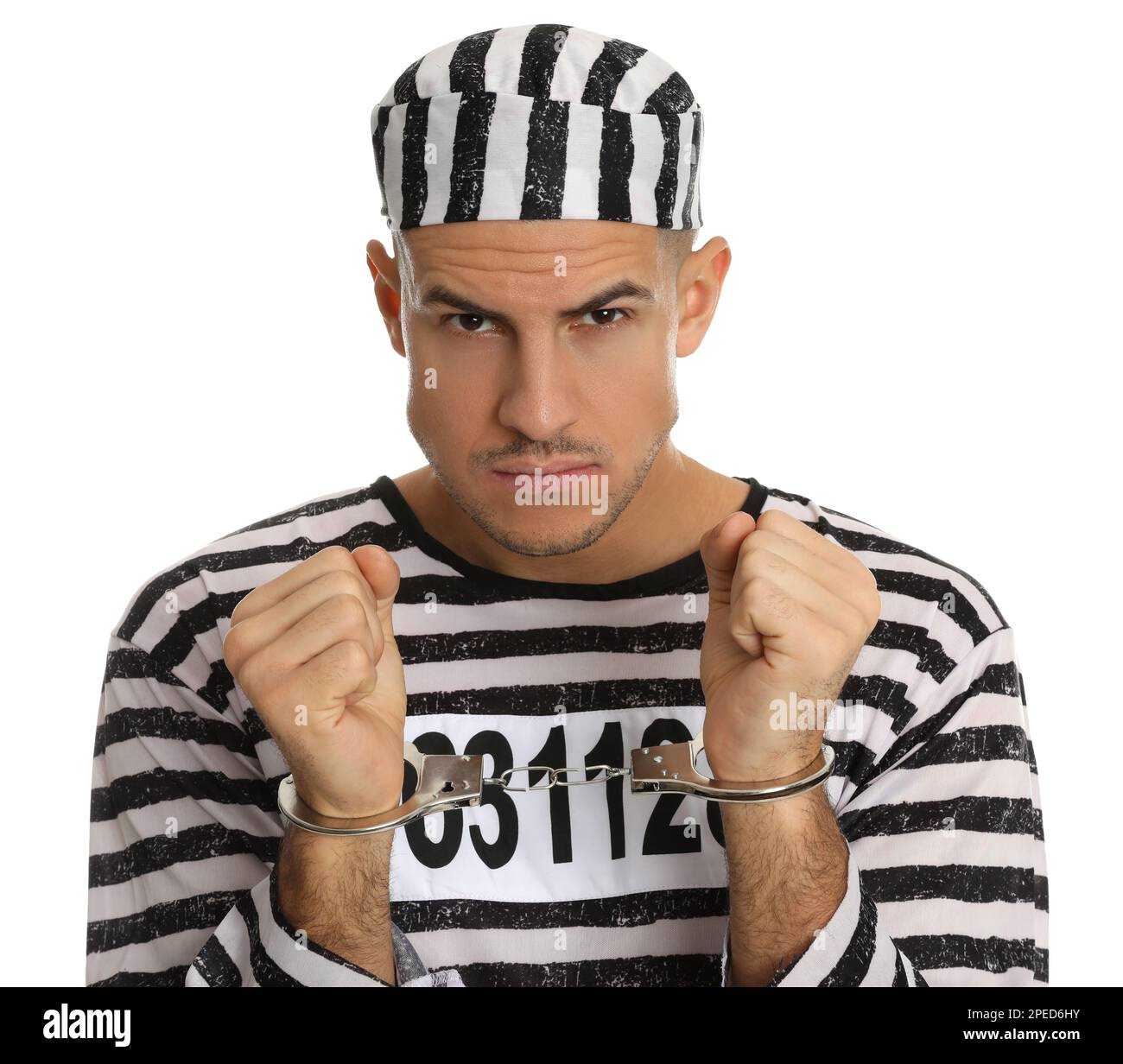 Prisoner in striped uniform with handcuffs on white background Stock ...