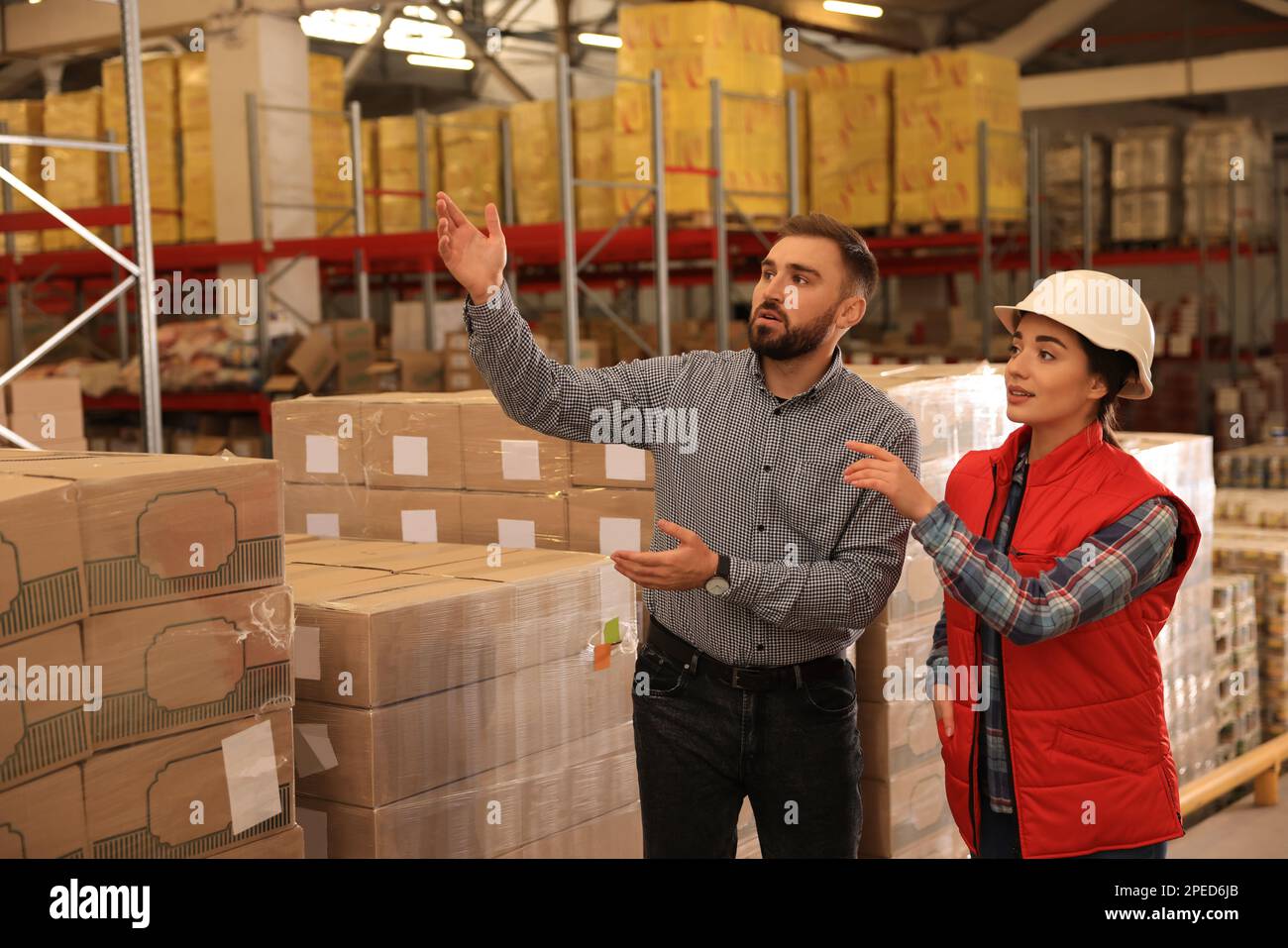 Manager and supervisor at warehouse. Logistics center Stock Photo - Alamy