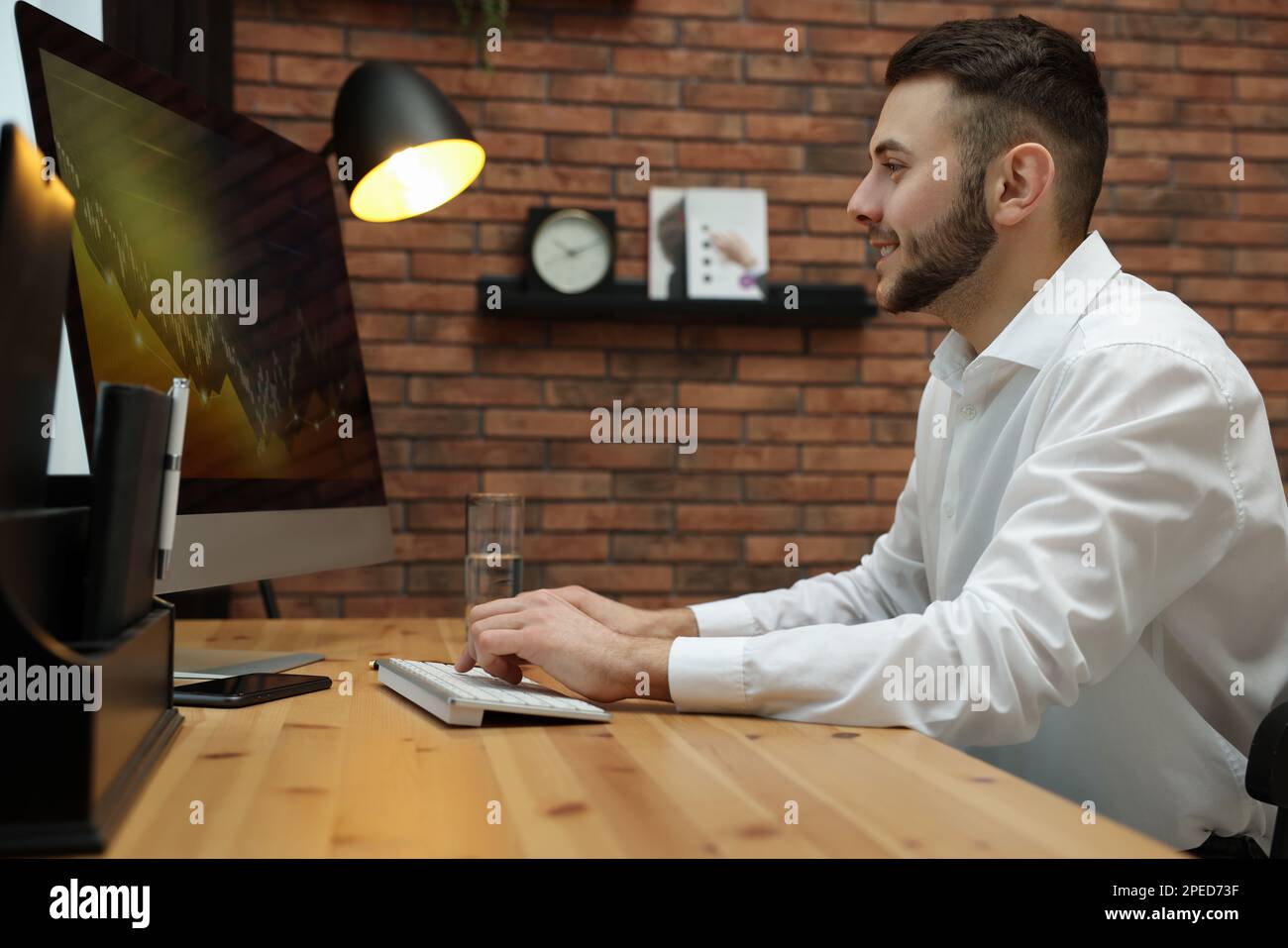 Trader in office using hi-res stock photography and images - Alamy