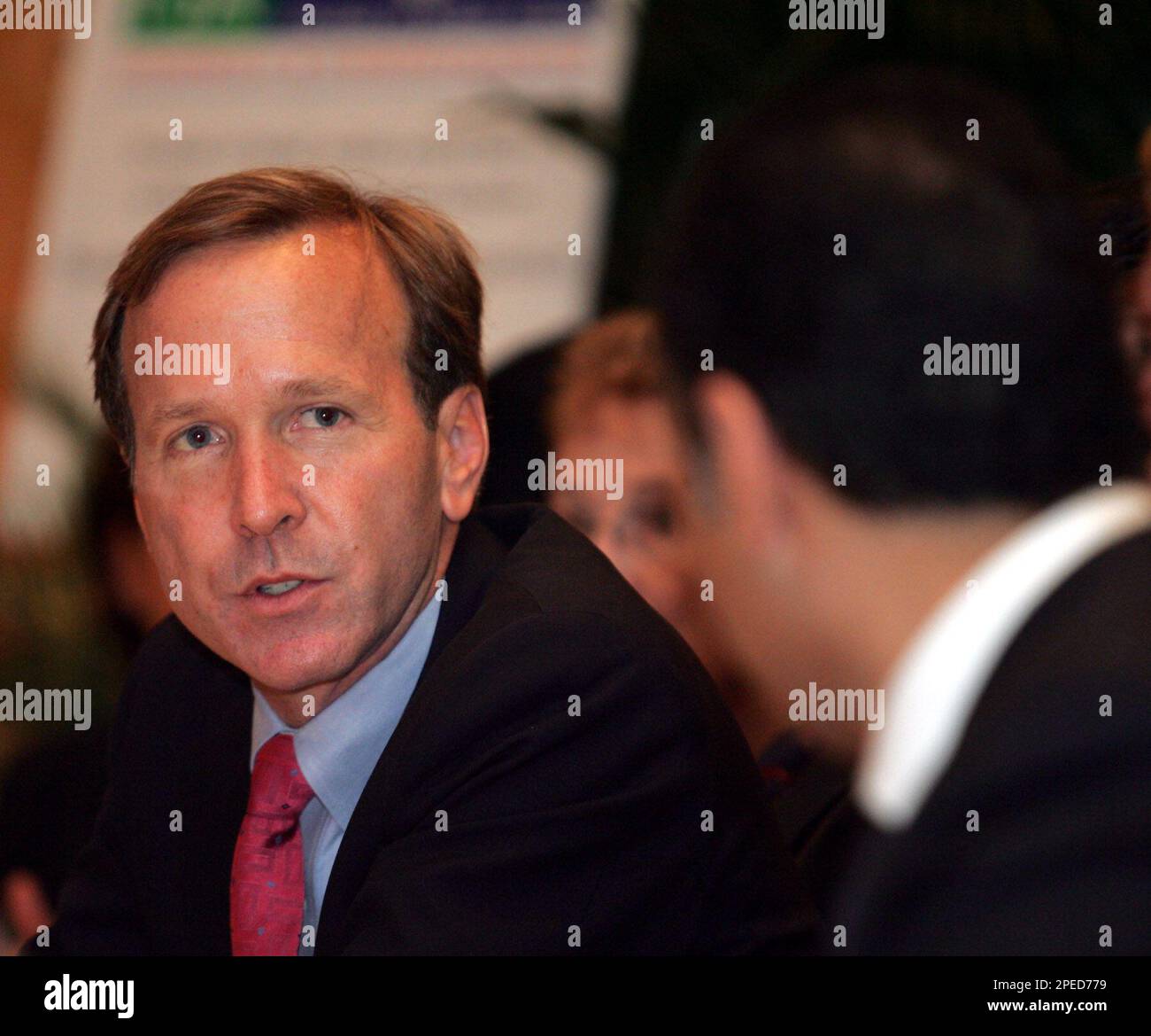 Neil Bush, left, brother of President Bush, talks to Prince Abdulaziz ...
