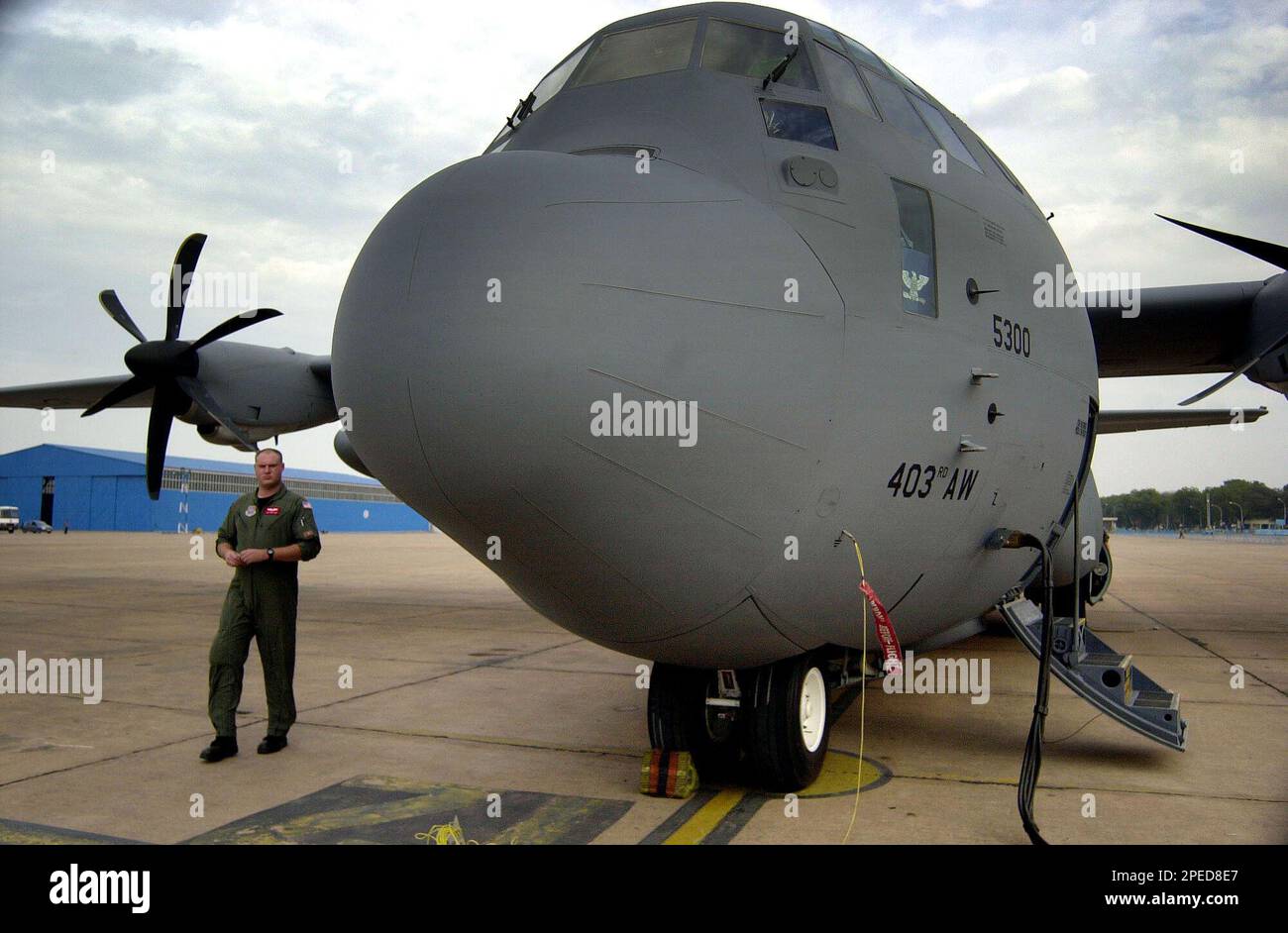An unidentified U.S. Air Force pilot walks past an U.S. Air Force C ...