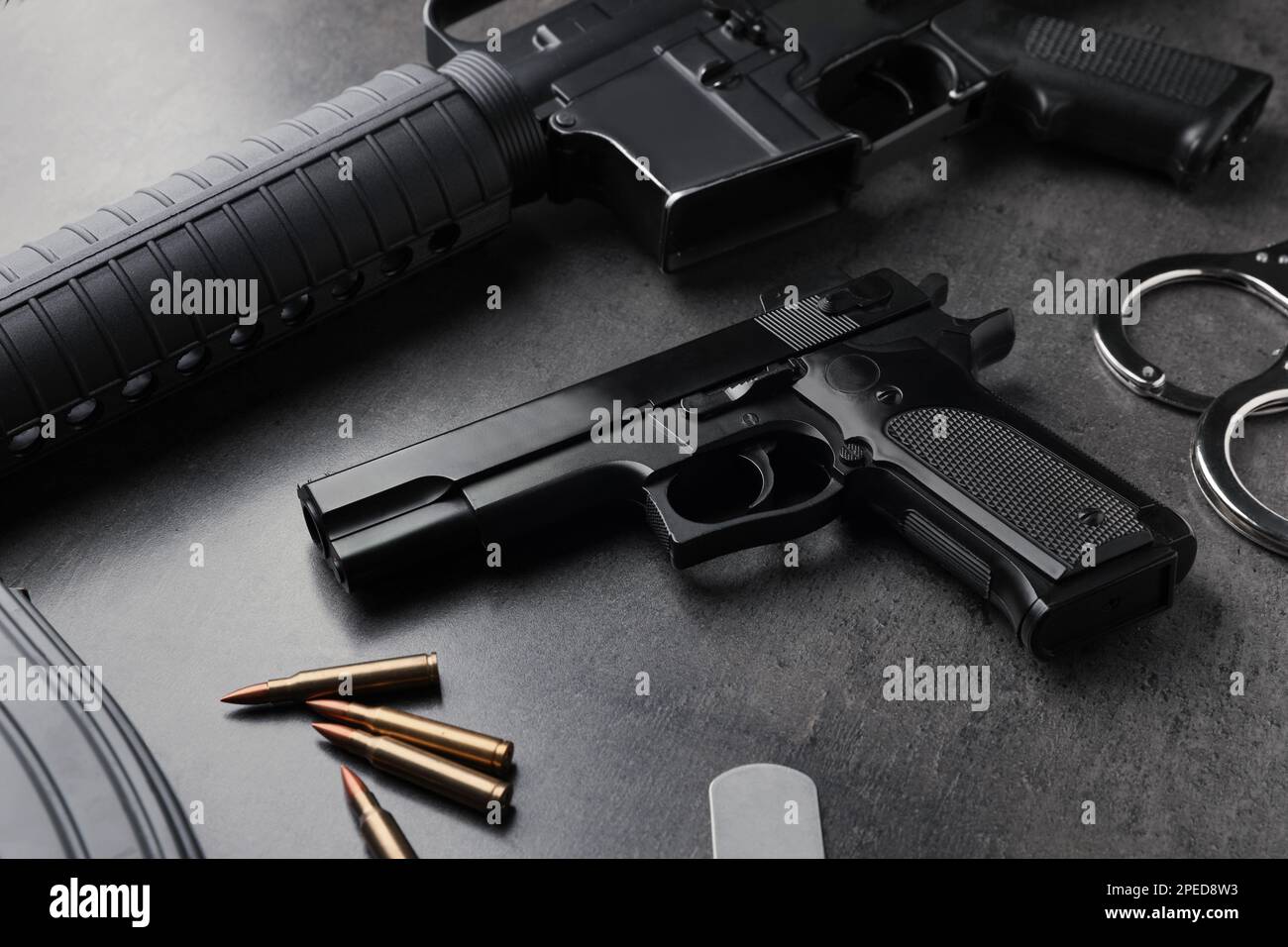 Pistol on stone hi-res stock photography and images - Alamy