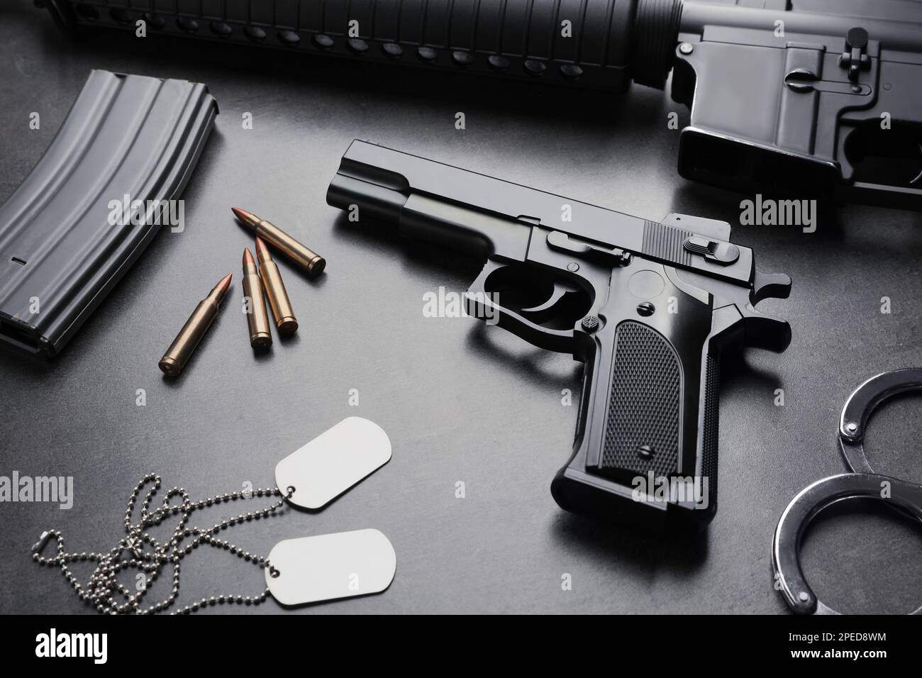 Hand gun on table hi-res stock photography and images - Alamy
