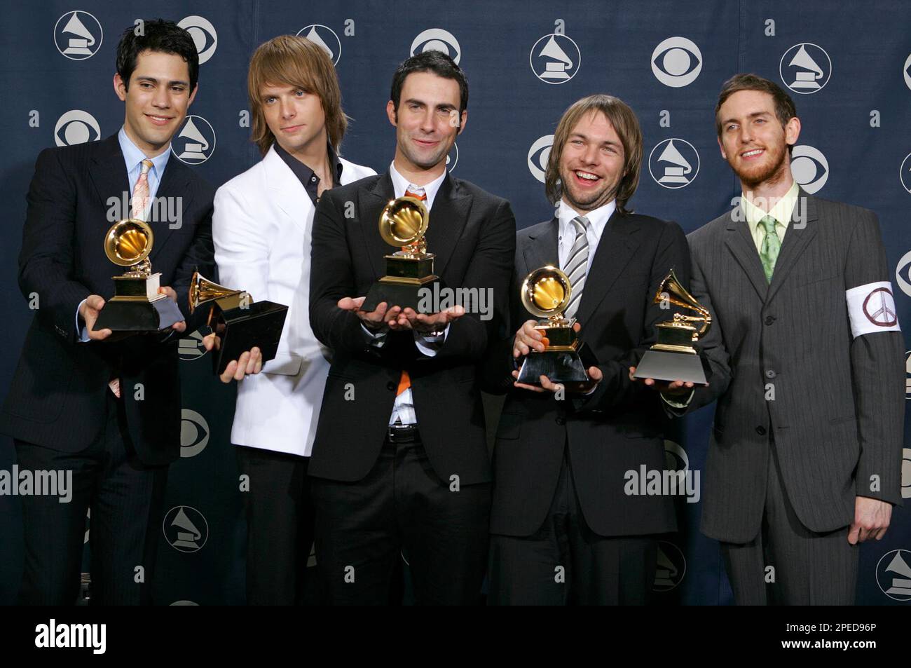 The group Maroon 5 pose with their awards for best new artist at the ...