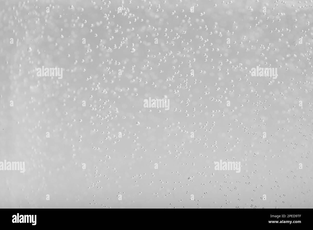 Soda water with bubbles of gas, closeup Stock Photo - Alamy