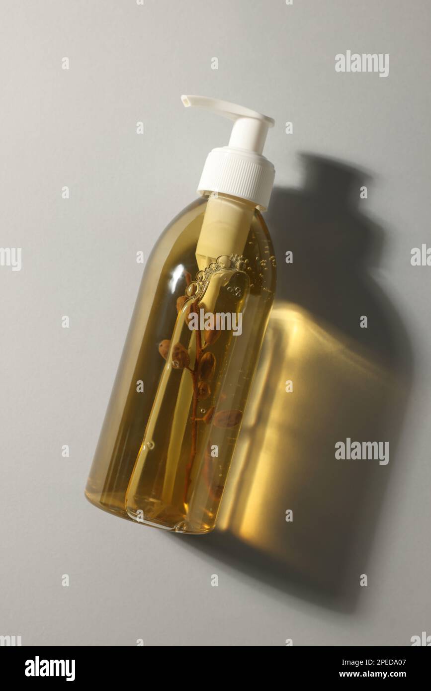 Bottle of liquid soap on light grey background, top view Stock Photo ...