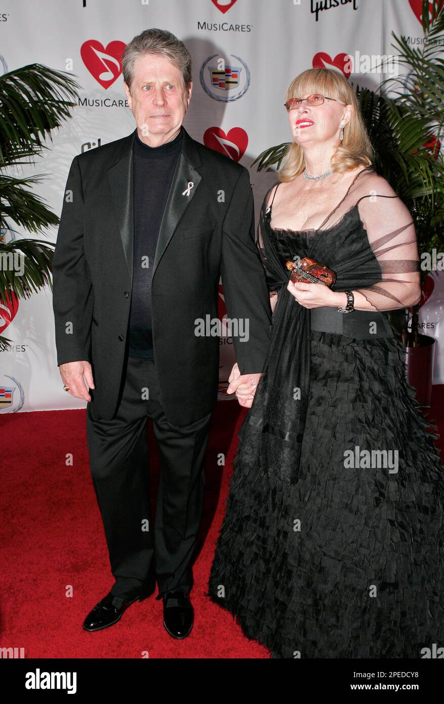 Brian Wilson arrives with his wife Melinda Ledbetter at MusiCares' 2005 ...