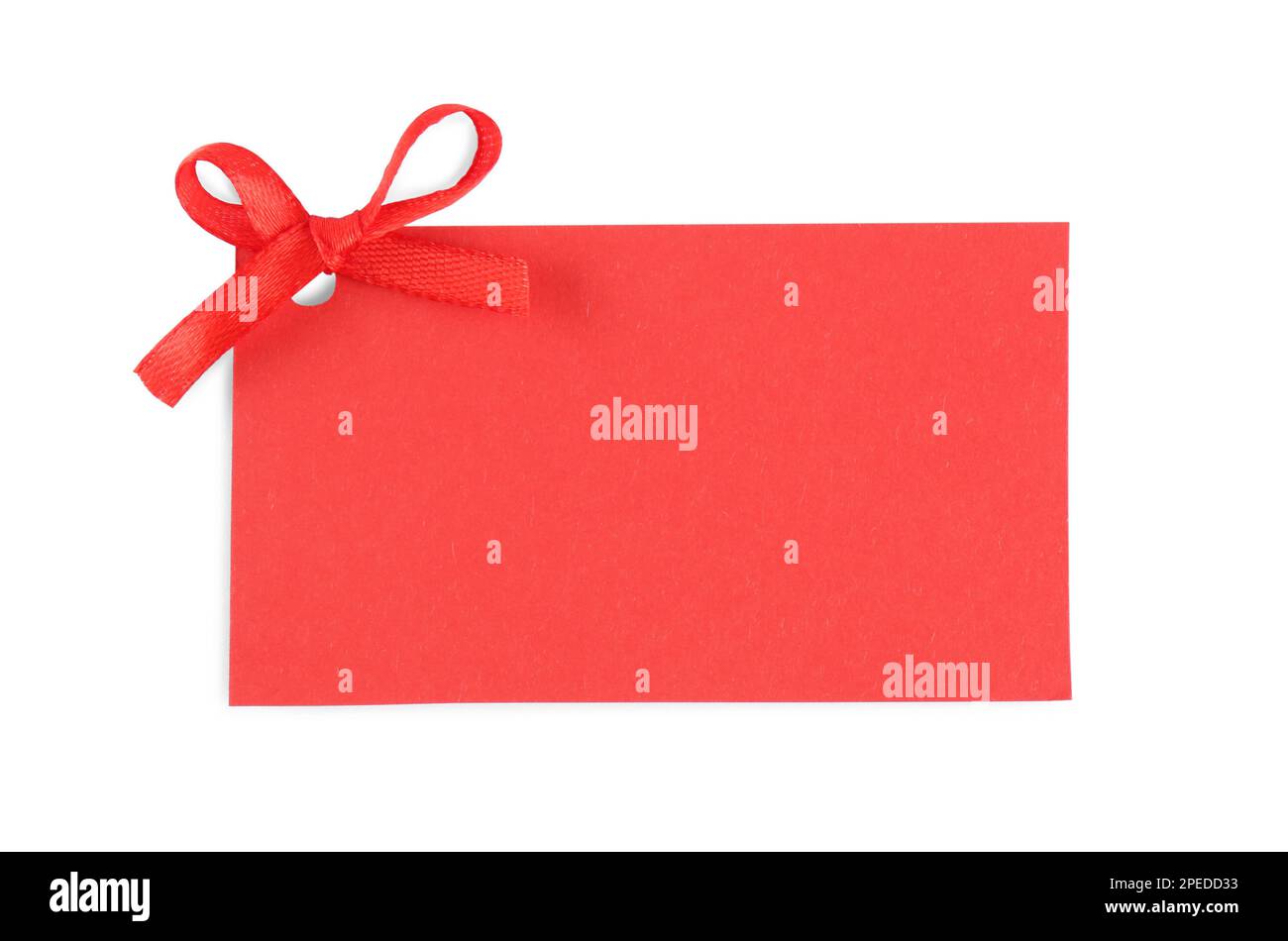 Blank red gift tag with satin ribbon on white background, top view ...