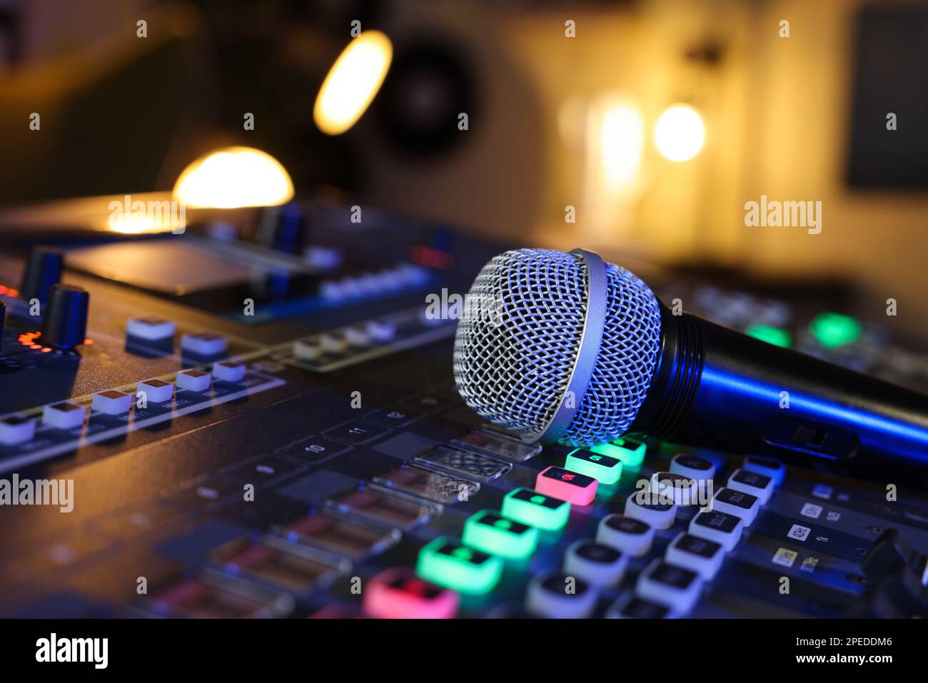 Microphone on professional mixing console in radio studio, closeup ...