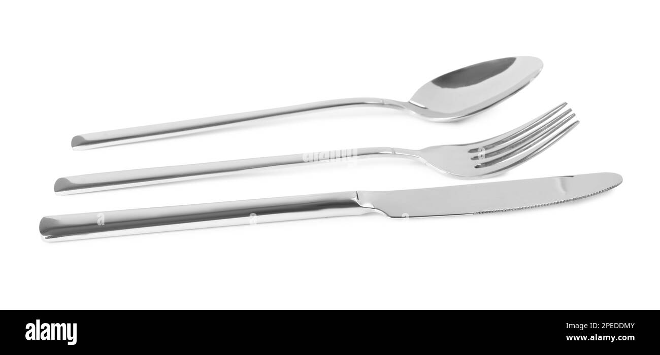 New shiny fork and knife on white background Stock Photo - Alamy