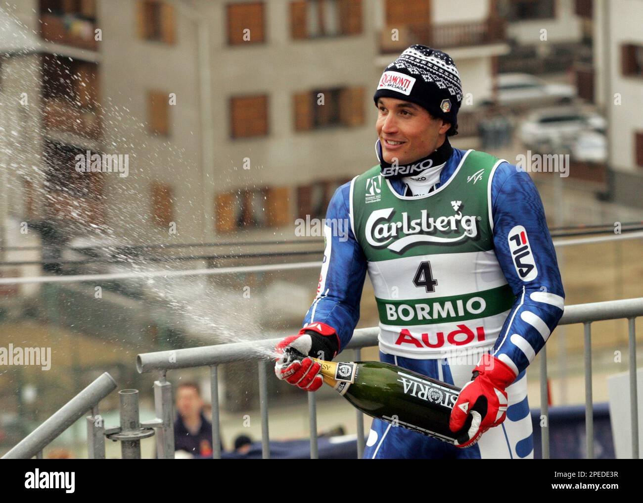 Giorgio Rocca of Italy sprays sparkling wine as he celebrates his ...