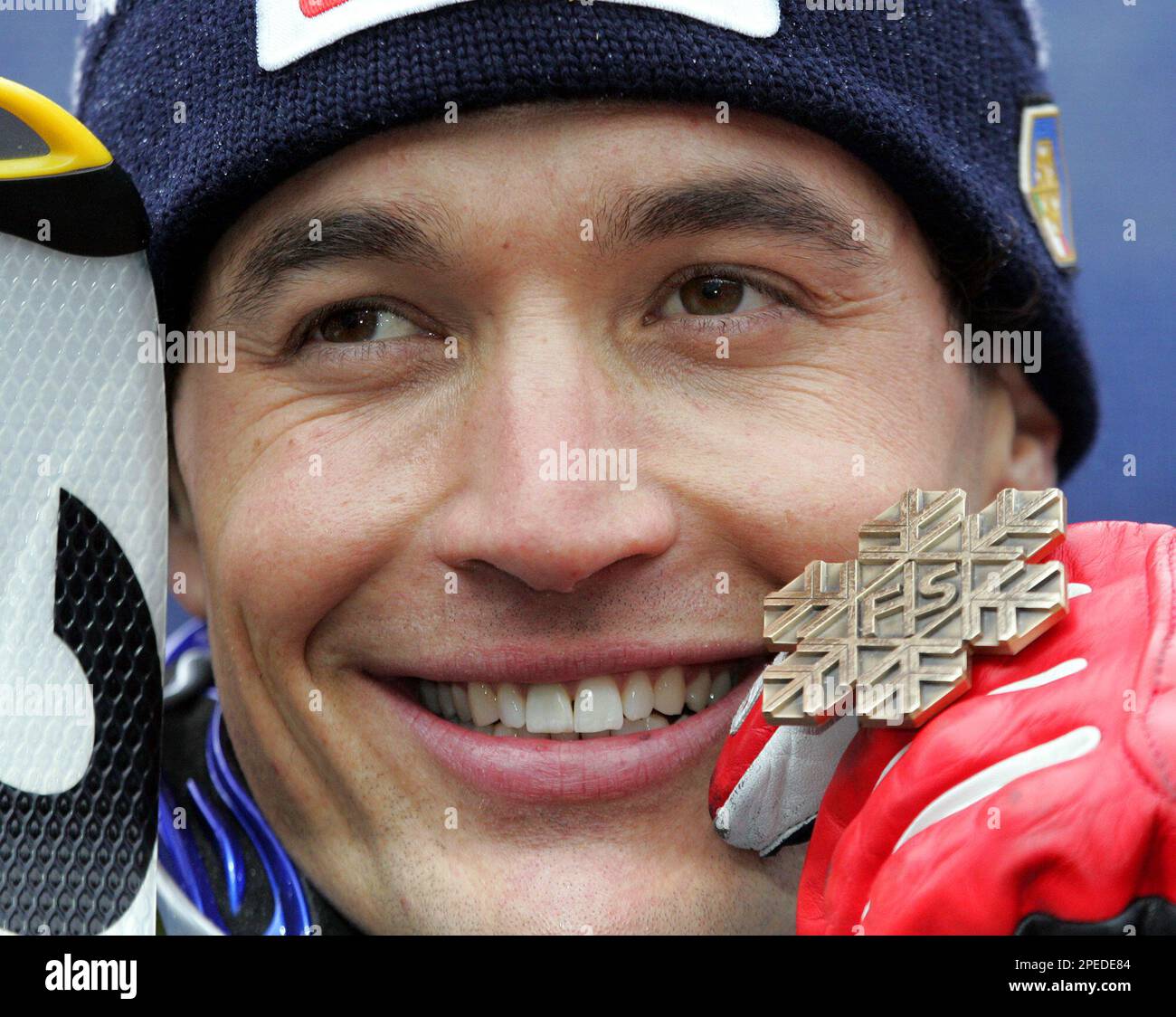 Italy's Giorgio Rocca celebrates with his bronze medal after the Men's ...