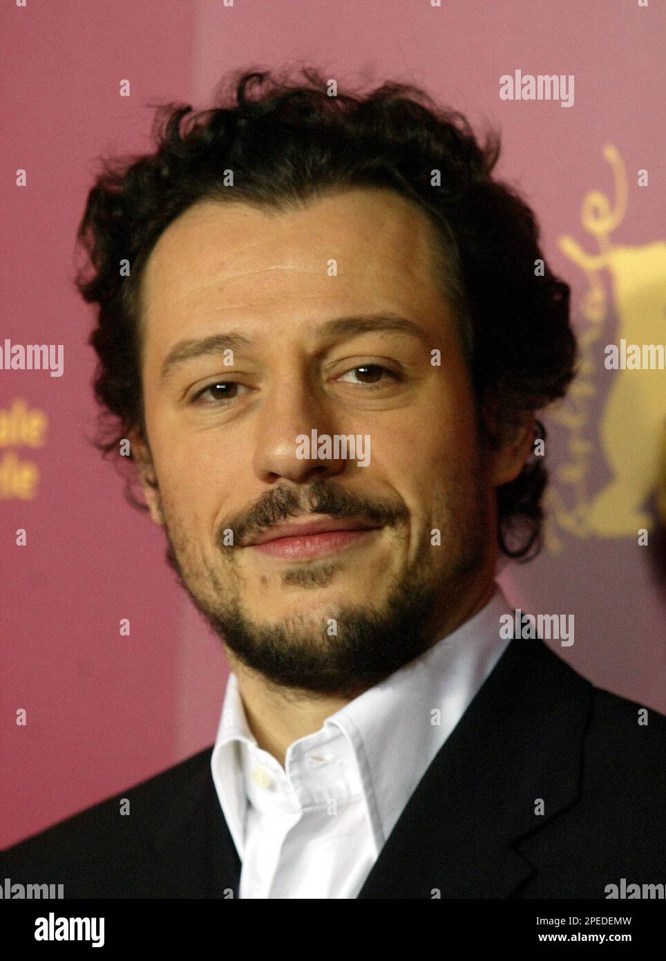 Italian actor Stefano Accorsi poses for the photographers at a ...