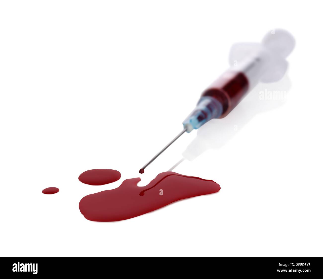 Plastic syringe with blood on white background Stock Photo - Alamy