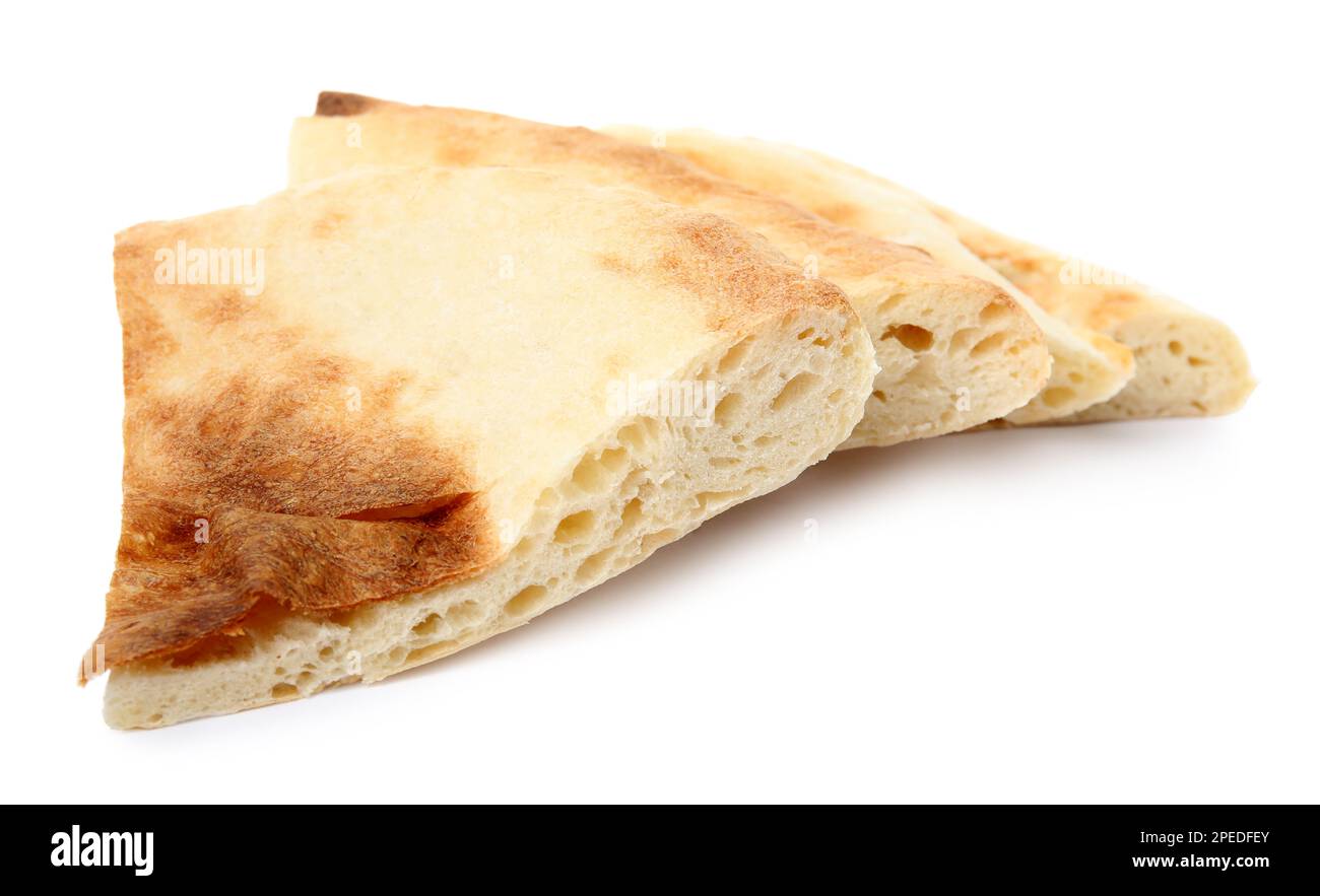 Cut fresh pita bread on white background Stock Photo - Alamy