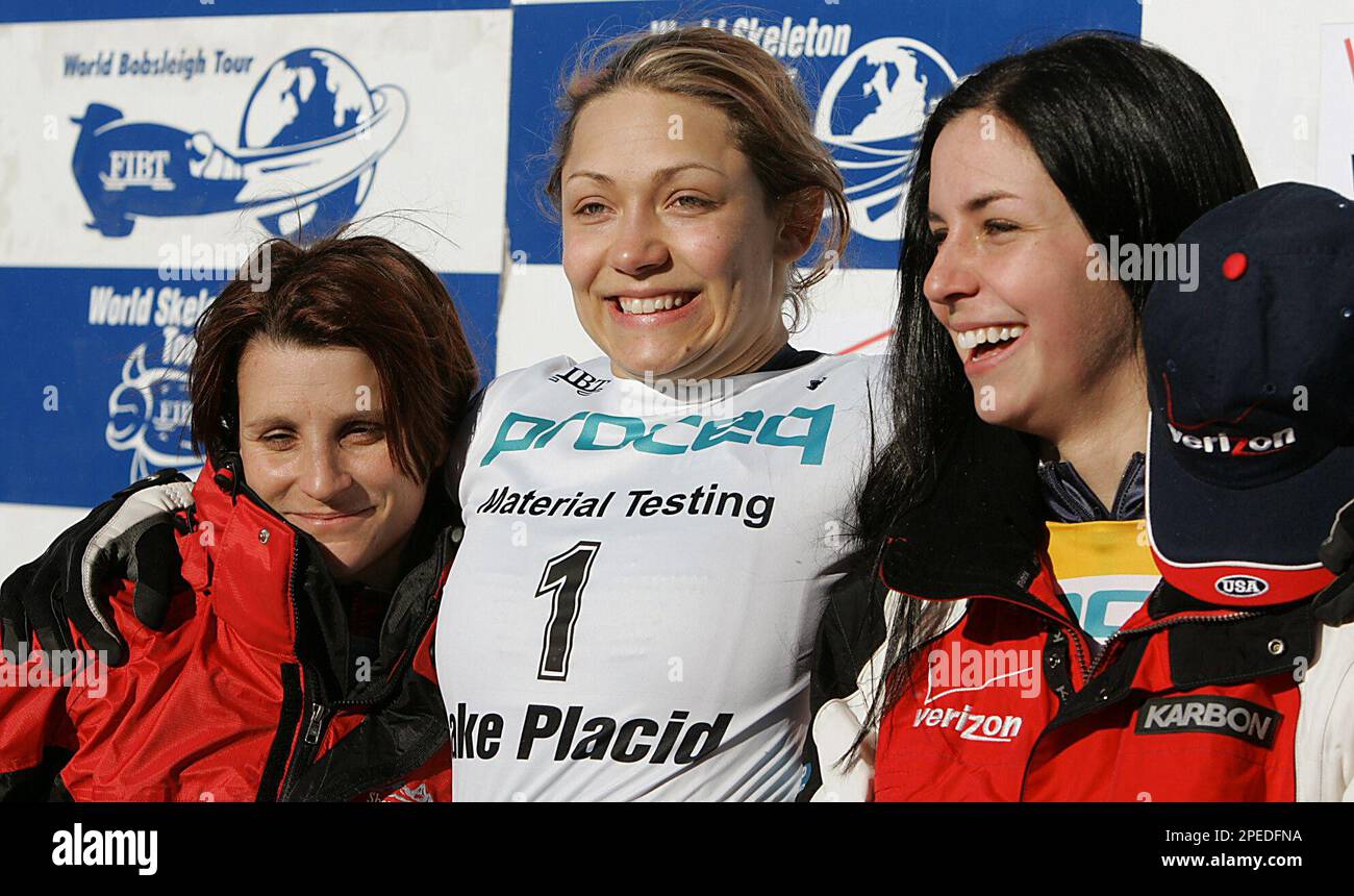 Winners of the Women's Skeleton World Cup event embrace on the podium ...