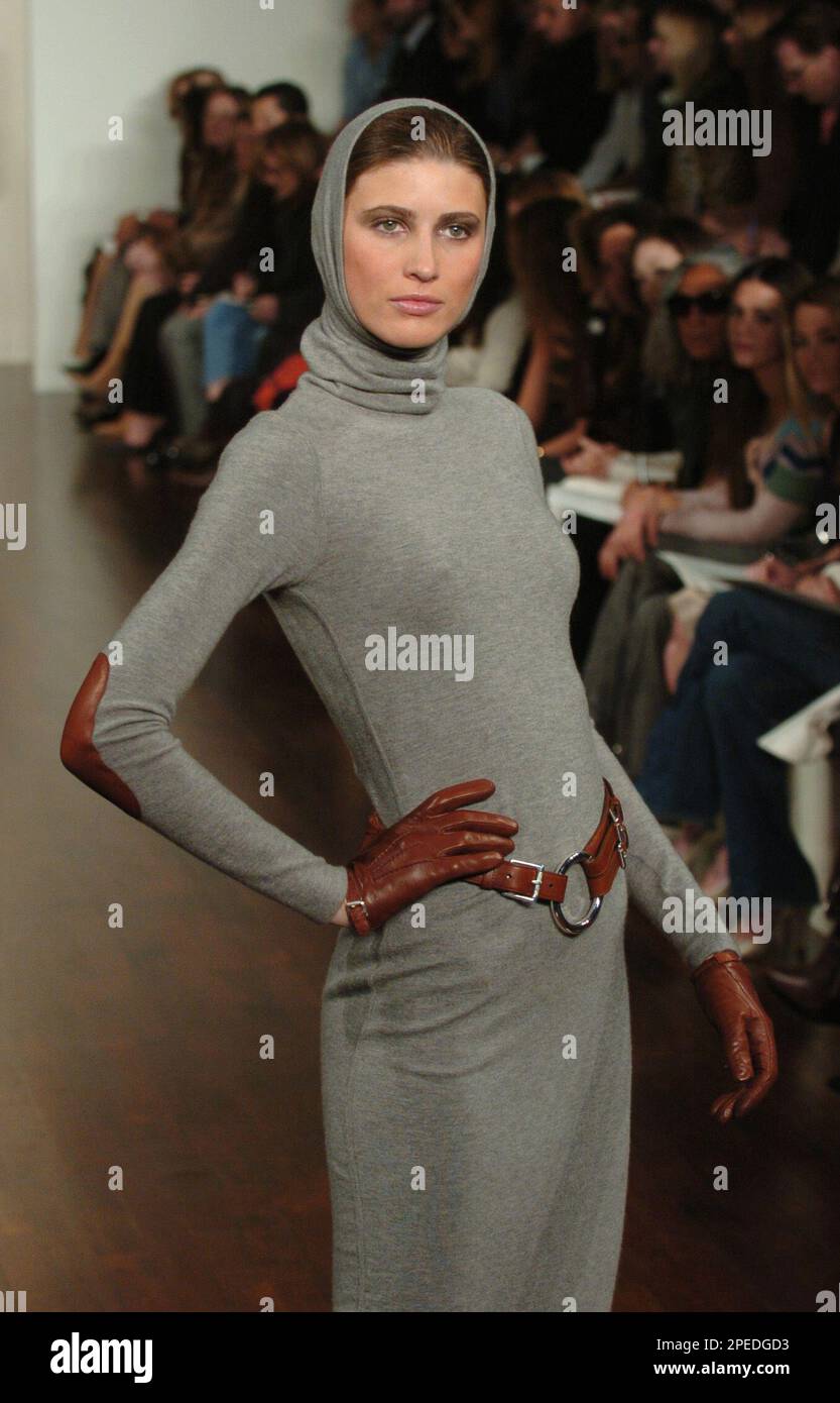 Michelle wears a medium grey cashmere dress at the showing of the Ralph ...