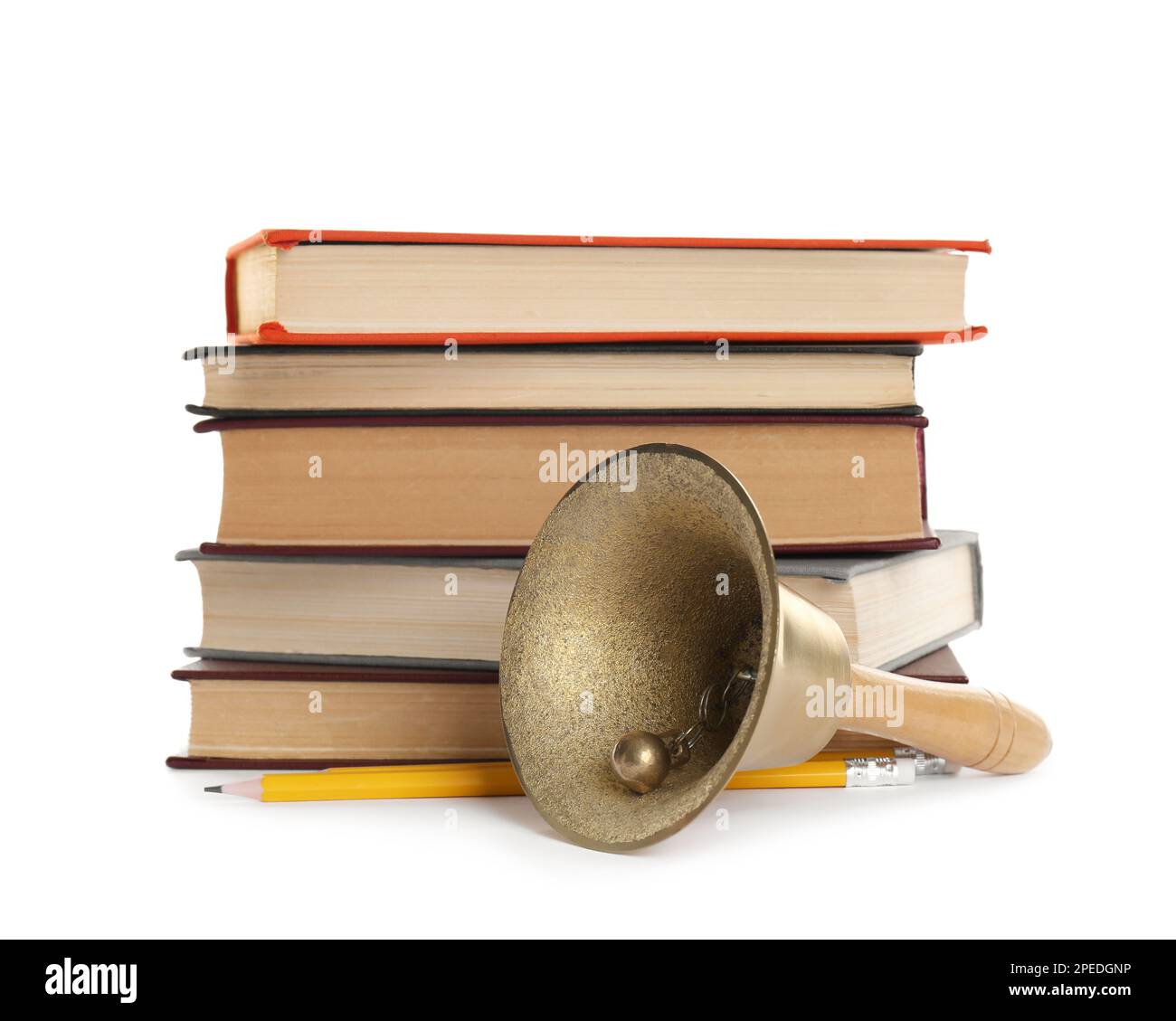 Golden school bell with wooden handle, pencils and stack of books on ...