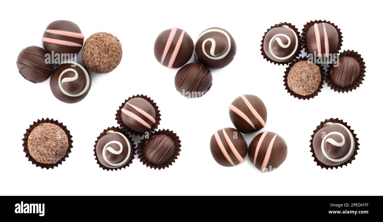 Set with delicious sweet chocolate truffles on white background, top ...