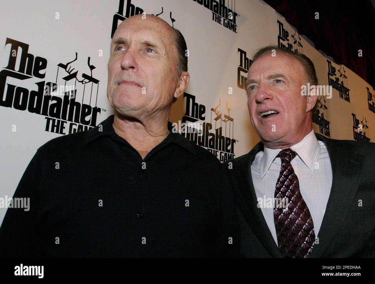 Robert Duvall, left, and James Caan pose for photographers as they ...