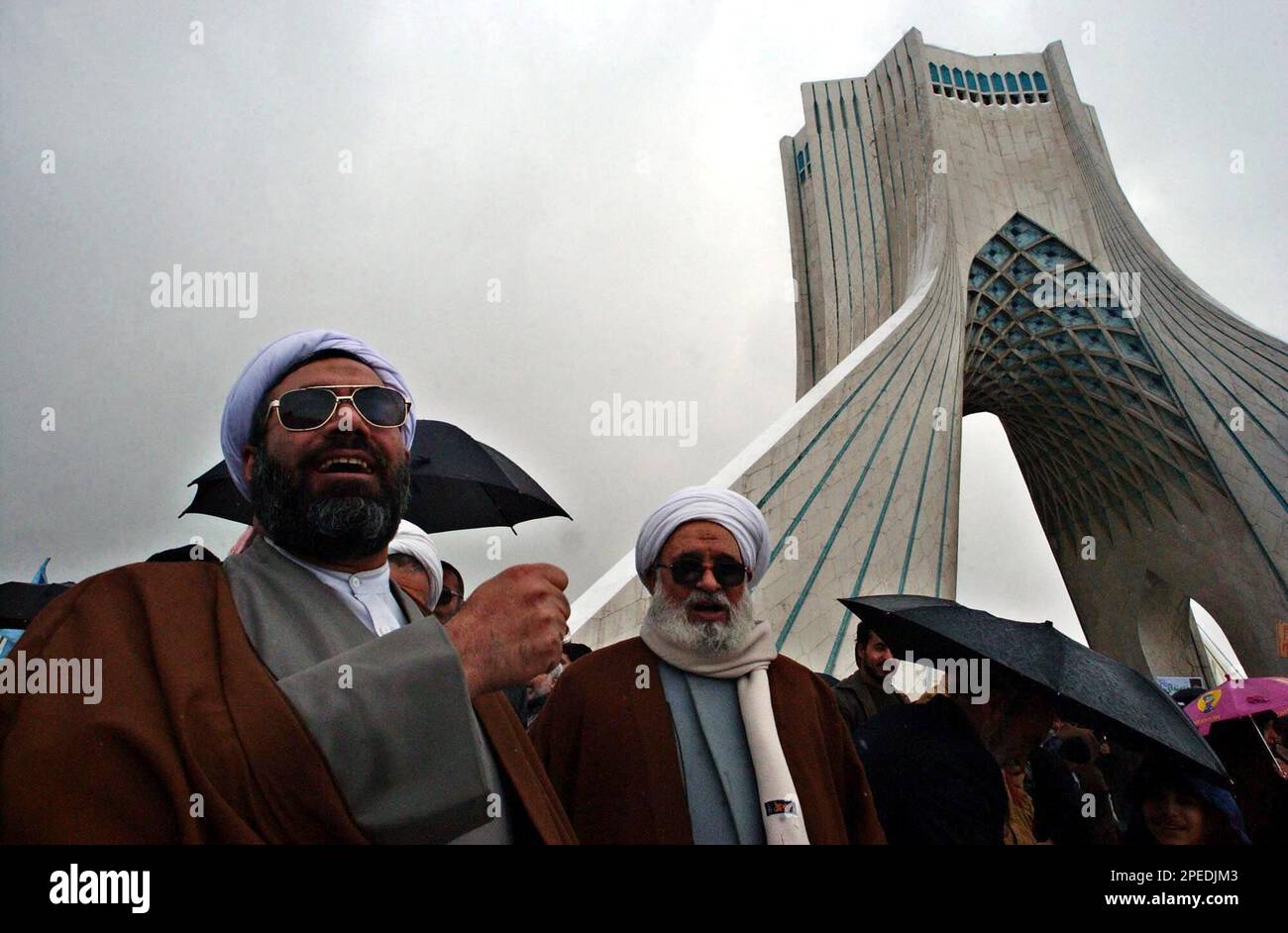 Under the Azadi (Freedom) tower, Iranian clergymen chant slogans in a ...