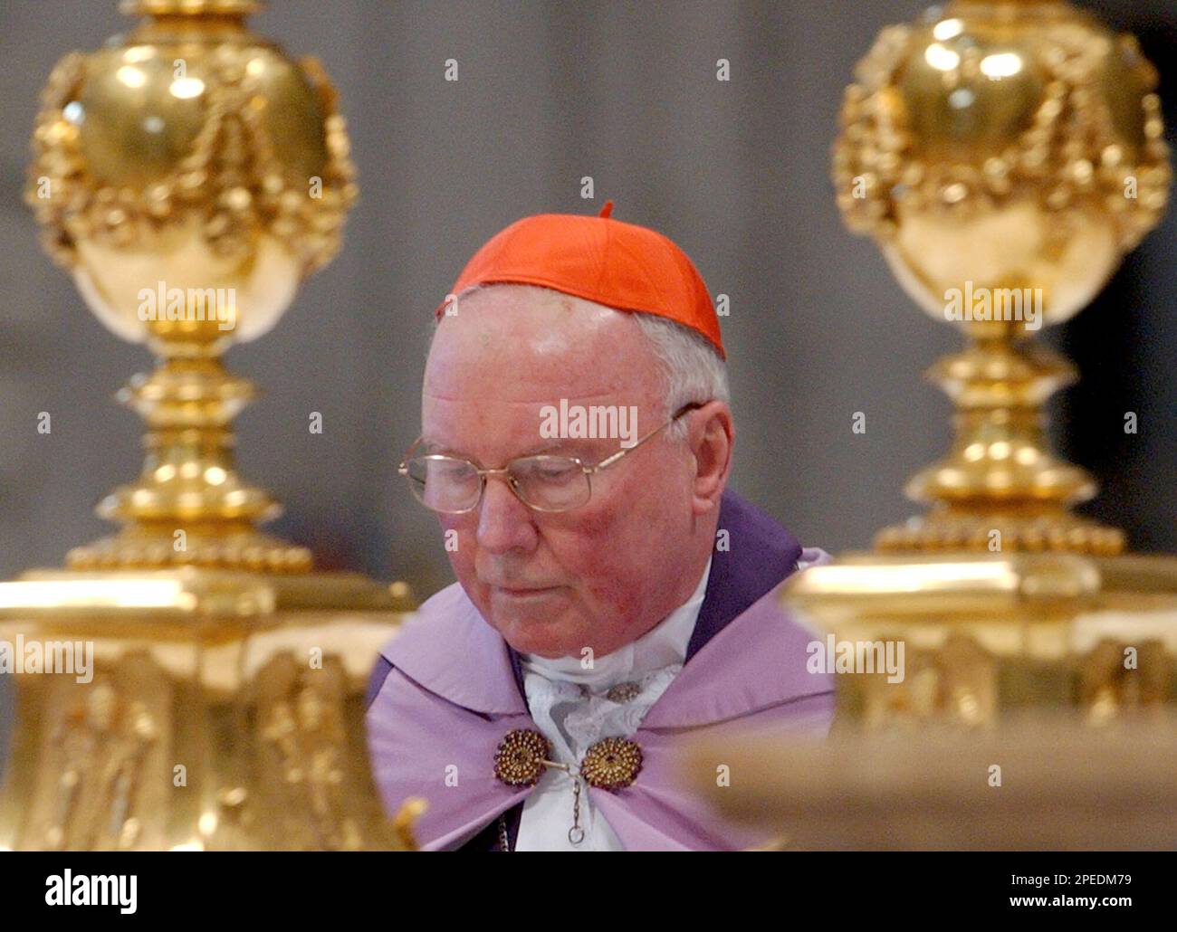 US Cardinal James Stafford looks down prior to presiding over Ash ...
