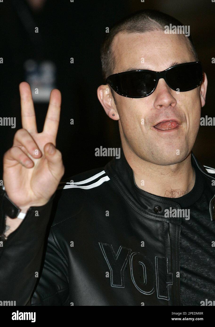 British pop star Robbie Williams arrives at the 25th annual Brits Music ...