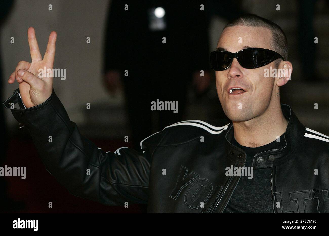 British pop star Robbie Williams arrives at the 25th annual Brits Music ...