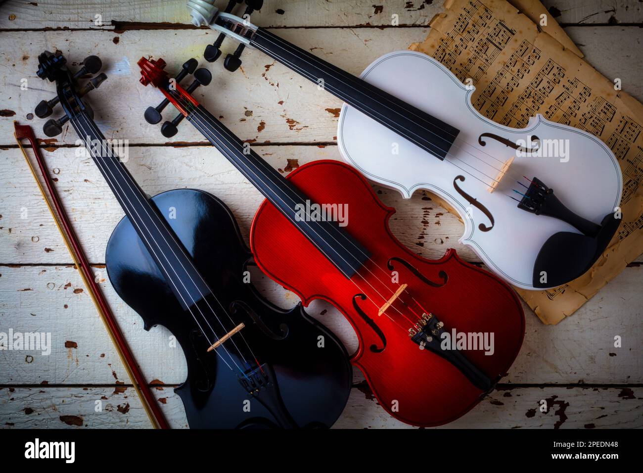 Three Violins And Sheet Music Still Life Stock Photo - Alamy