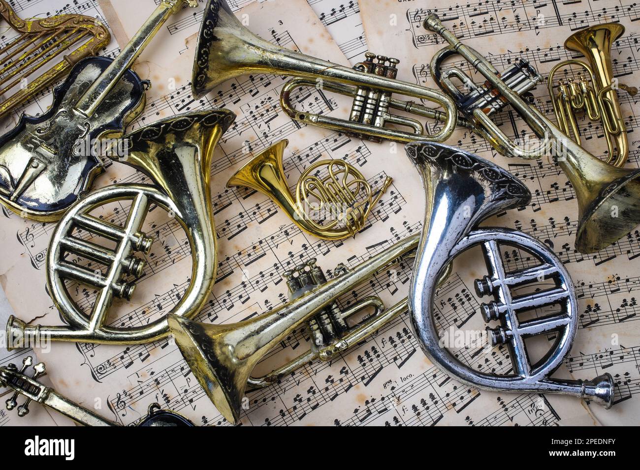 Music Instruments On Sheet Music Stock Photo - Alamy