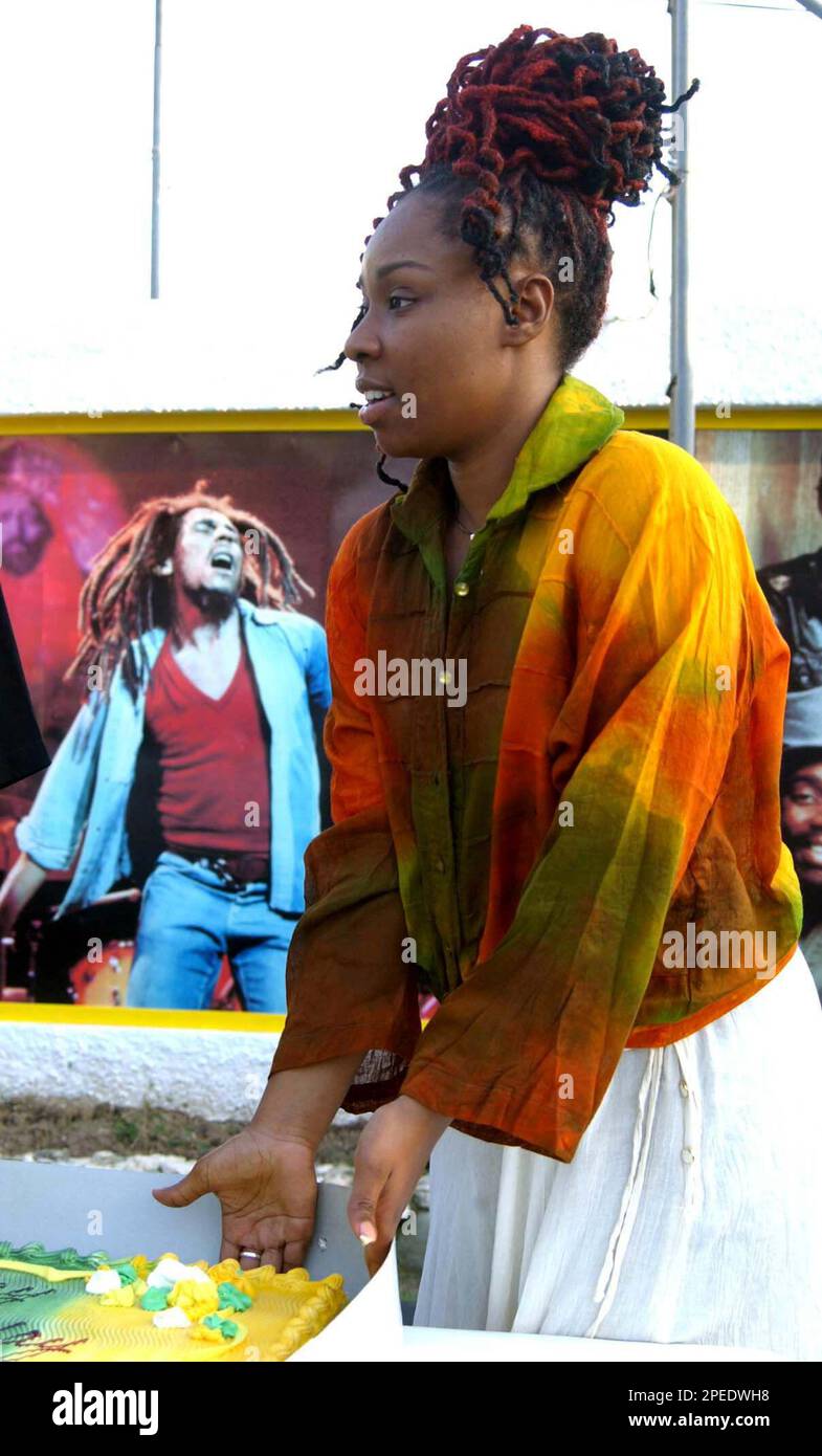 Stephanie Marley, daughter of the late Bob Marley, lifts a birthday ...