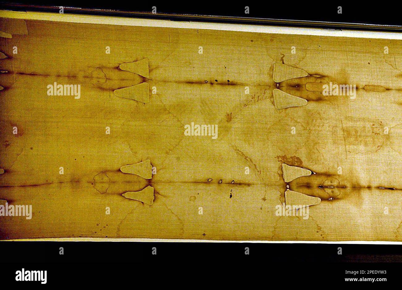 The "Shroud of Turin," the 14 foot-long linen strip revered by some as ...