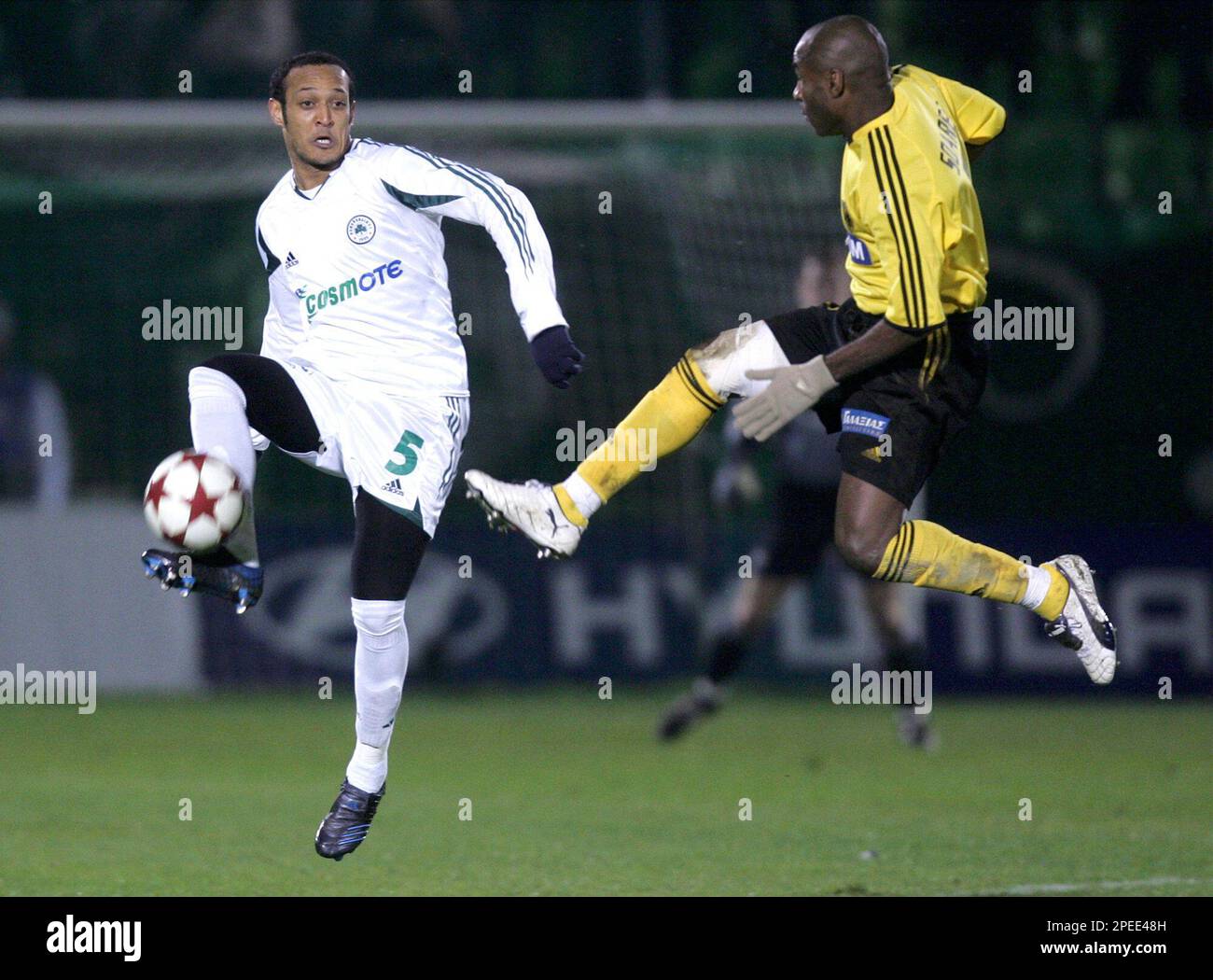 Panathinaikos' defender Nasief Morris from South Africa, left, kicks ...