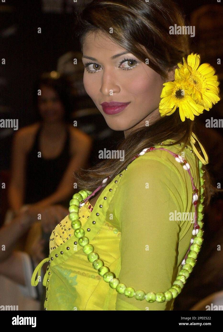 An Indian model displays creations by designer Malani Ramani during the ...