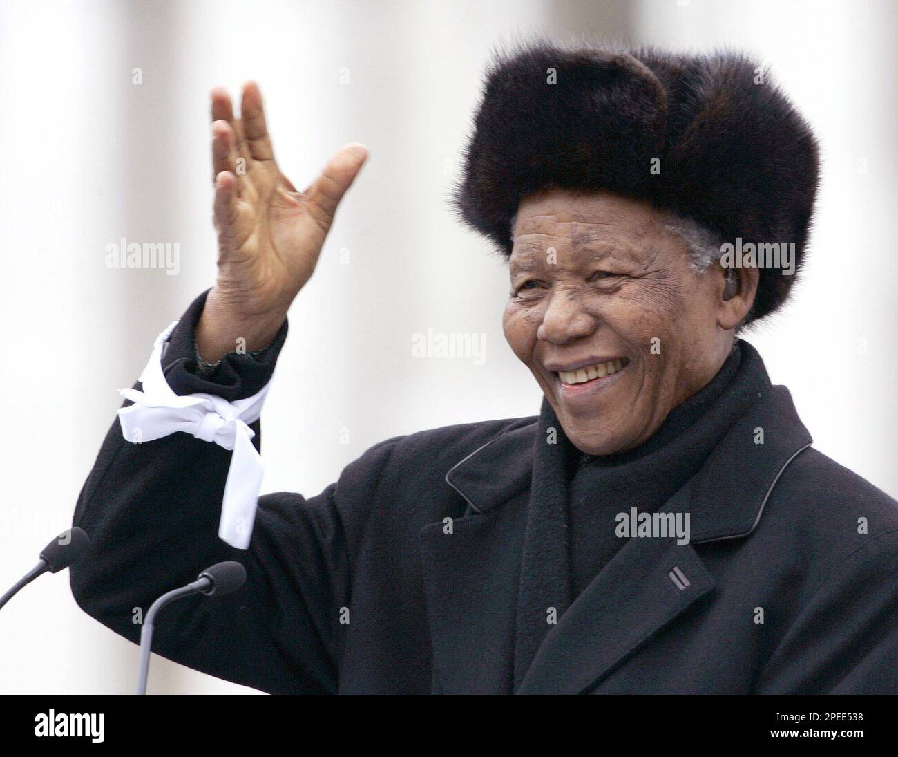 South Africa's former president Nelson Mandela waves to the crowd in ...