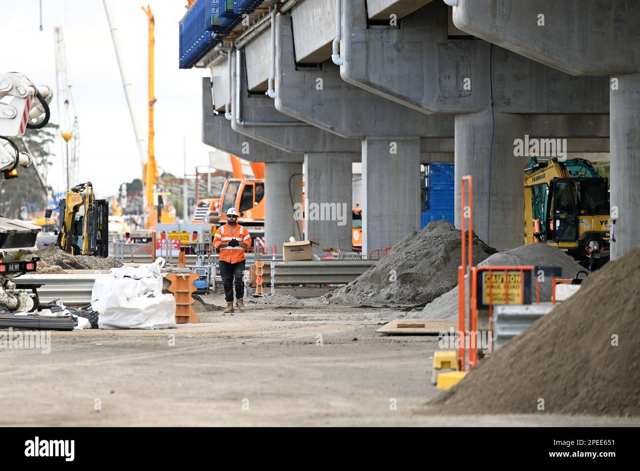 Construction workers are seen on a construction site in Melbourne ...
